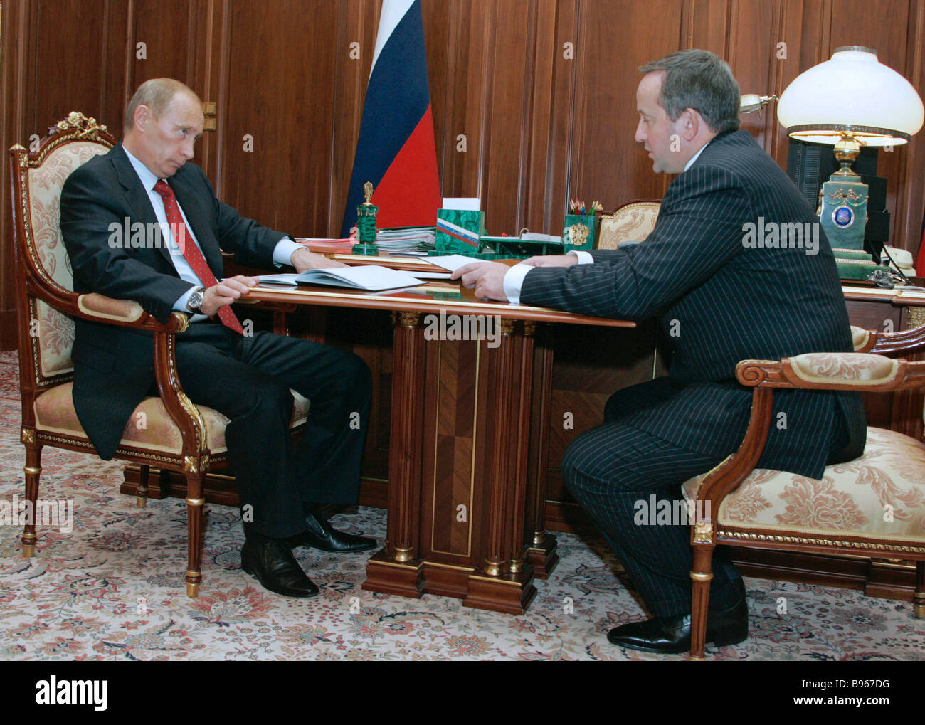 President Vladimir Putin left meets in the Kremlin with Andrey Kazmin ...