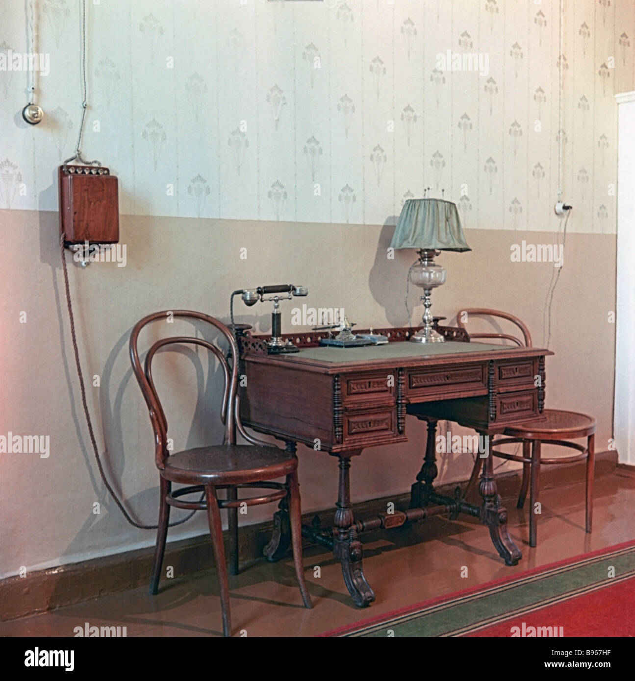 A desk with a telephone and a lamp in Lenin s museum room in the Smolny ...