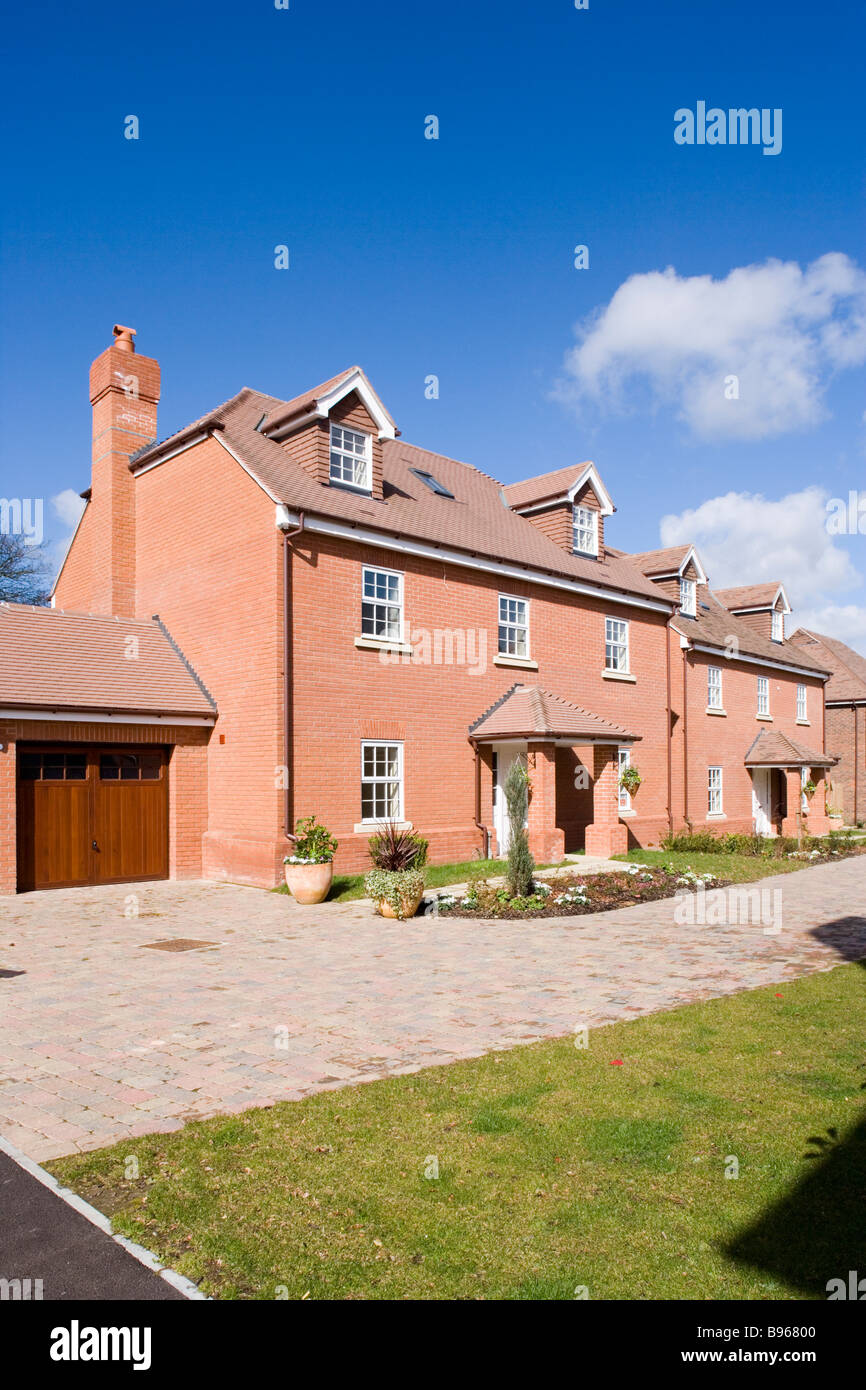 Detached house with garage Stock Photo - Alamy