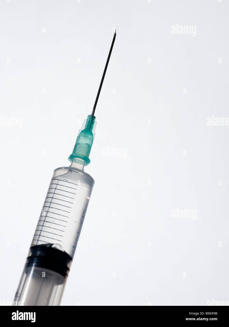A medical Syringe and hypodermic needle on white background Stock Photo ...