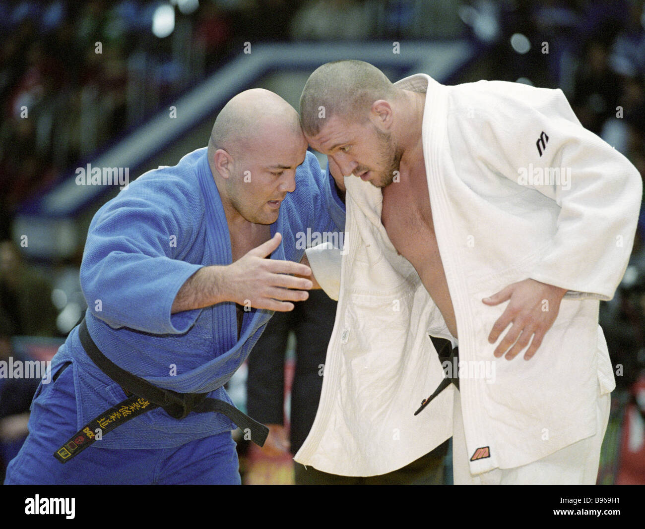 A Russian heavyweight in white kimono in a bout International Judo ...