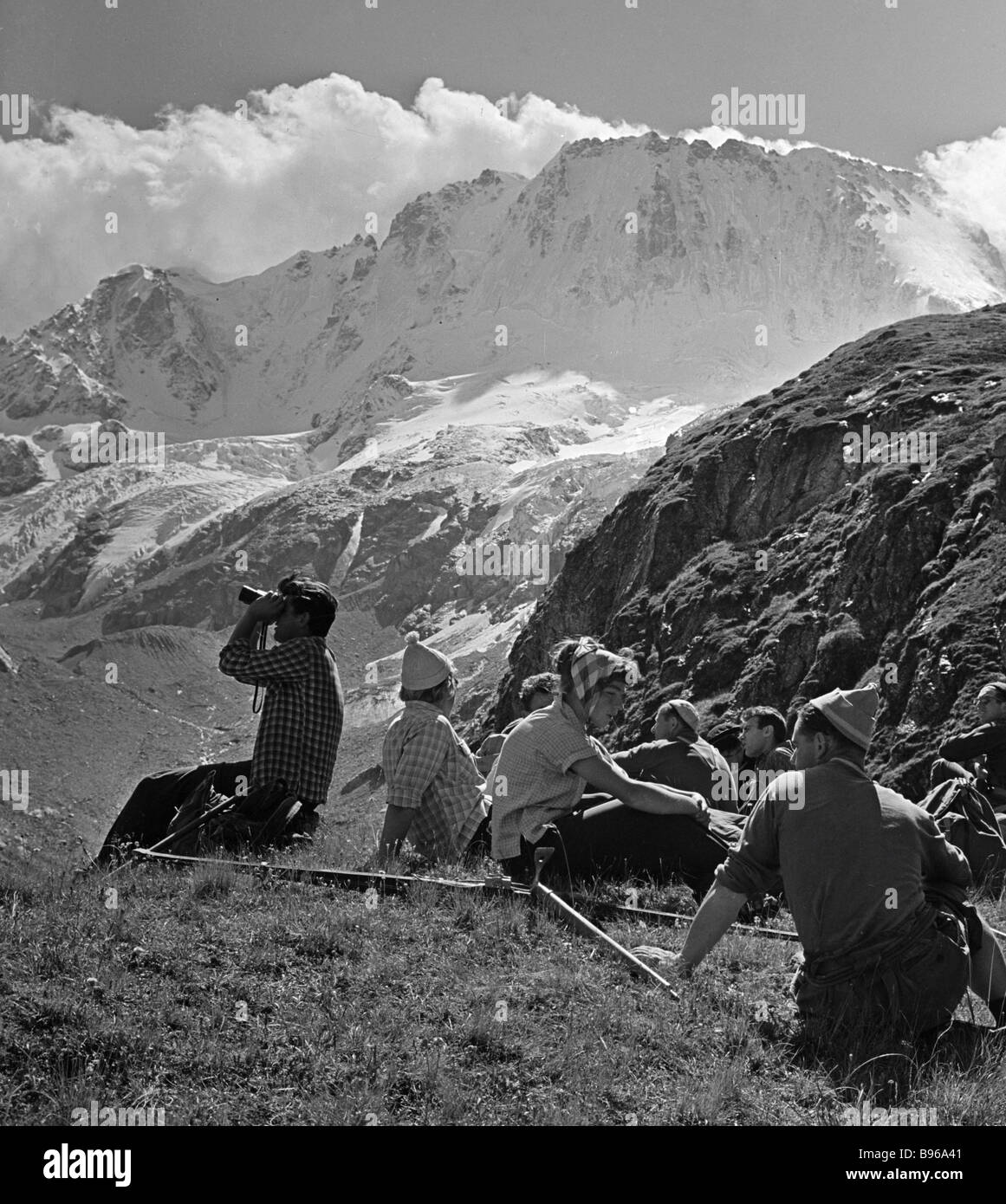 Hikers taking a rest Stock Photo - Alamy