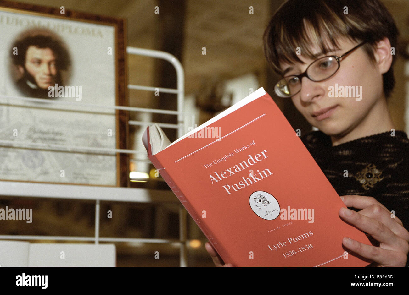 Girl at presentation of world s first Pushkin complete works 15 volumes ...