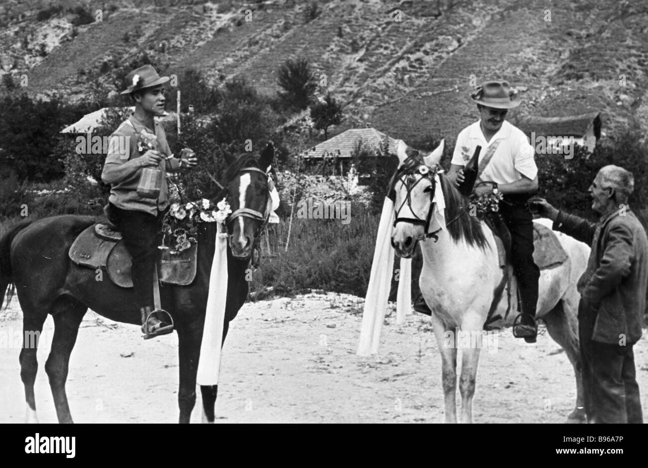 Messengers inviting guests to a Moldovan wedding Stock Photo - Alamy