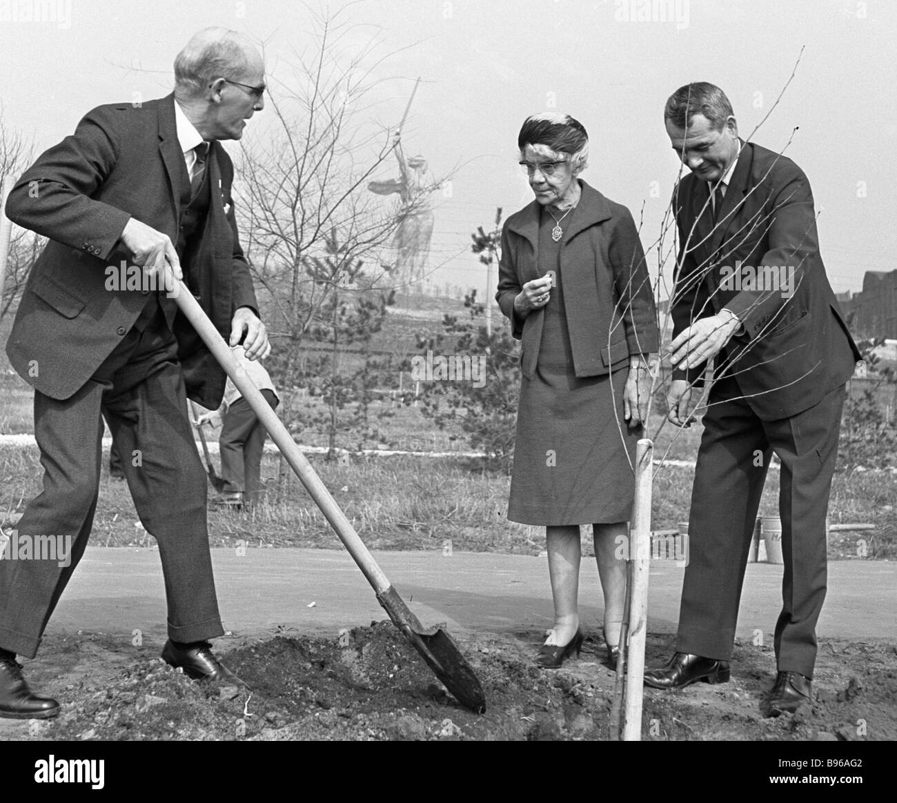 Coventry Mayor Edwin Rogers left and his wife center plant trees on ...