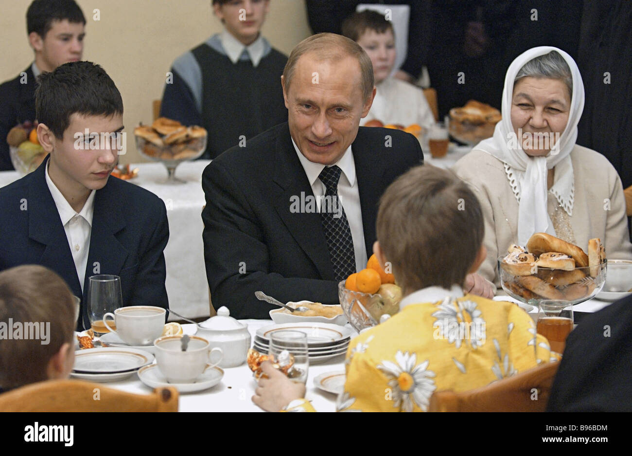Russian President Vladimir Putin visiting an orphan asylum in ...