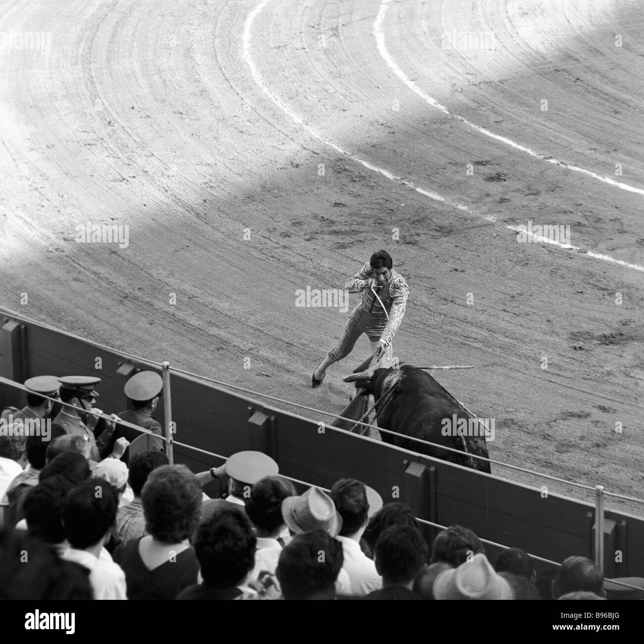 A toreador fighting a bull during the bullfighting in Barcelona Stock ...