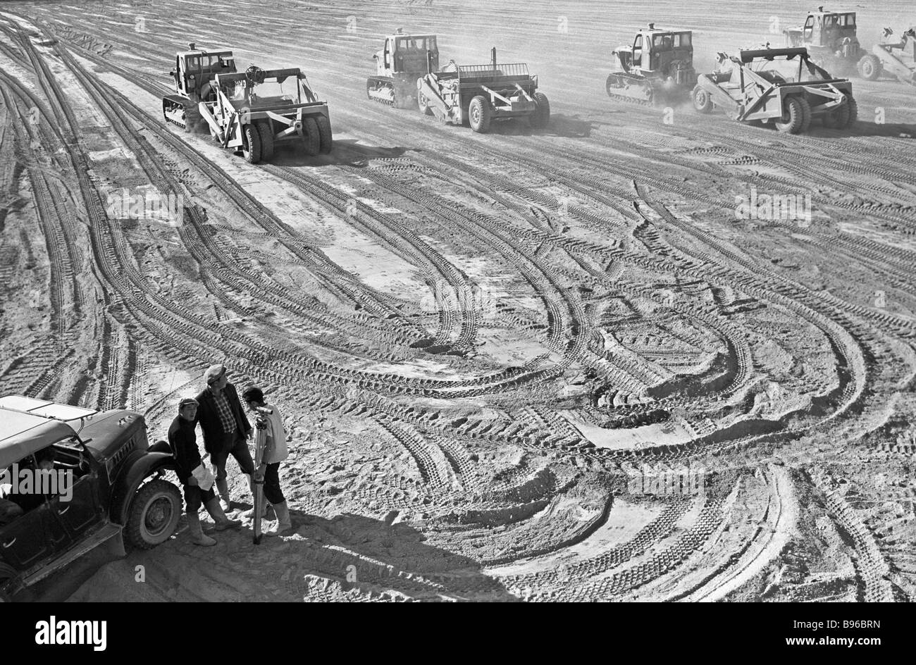 A tractor team doing agrotechnical work in the desert Stock Photo - Alamy