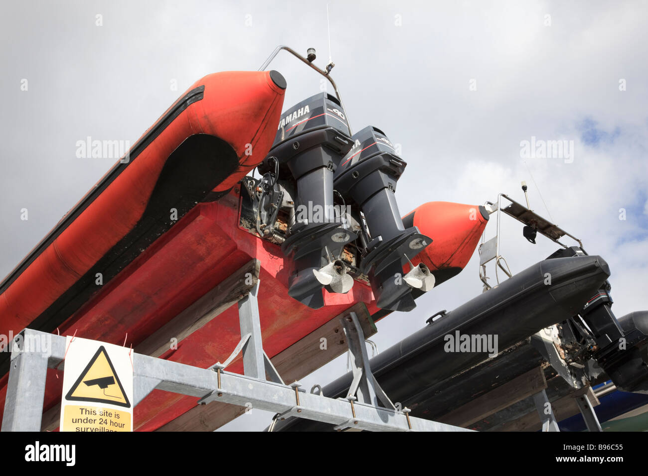 RIBs in a Rack in Portsmouth showing the outboard motors Stock Photo ...