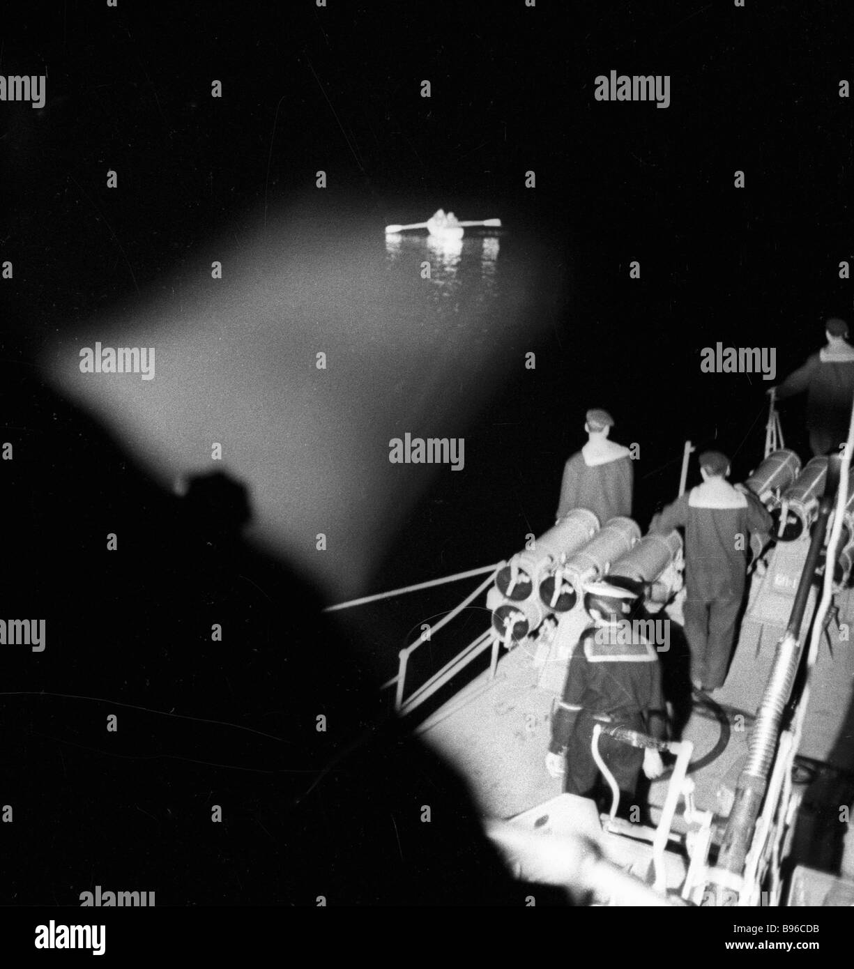 An enemy boat in the beam of a searchlight during Black Sea Fleet ...