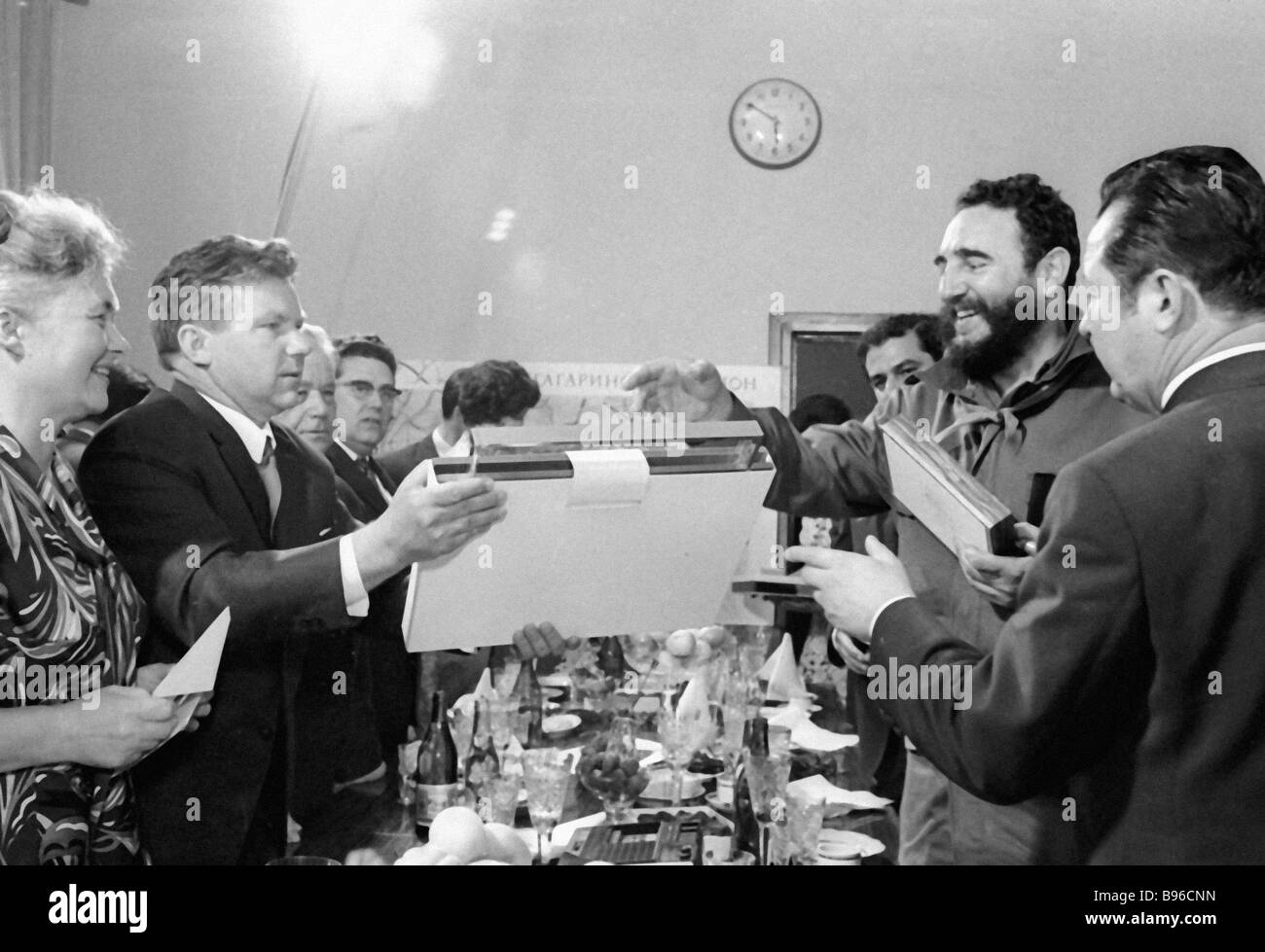 Cuban leader Fidel Castro second from right receiving presents from ...