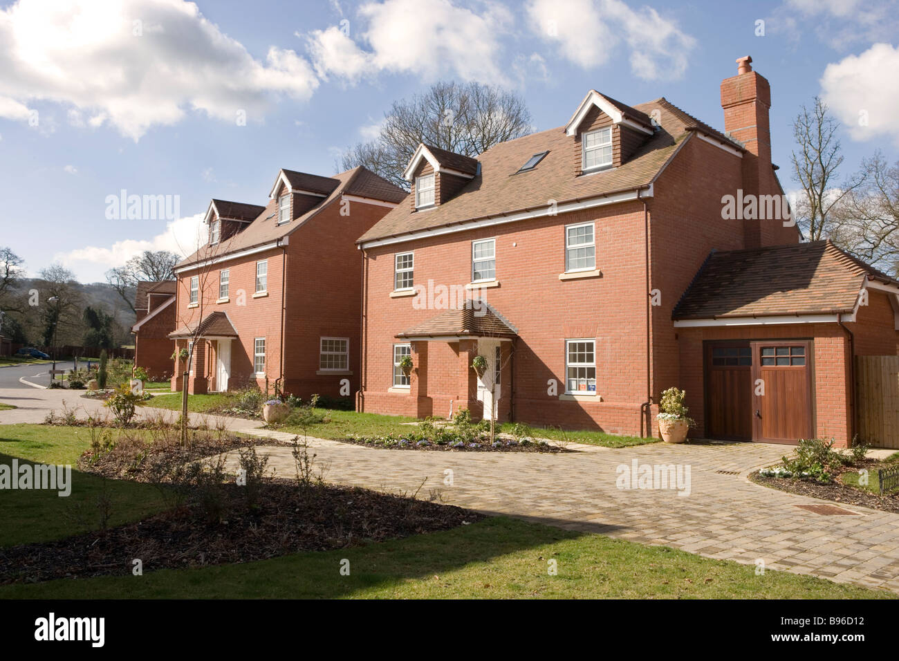 Detached houses with garage Stock Photo - Alamy