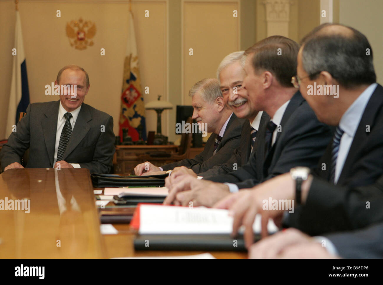 President Vladimir Putin left in session with Security Council members ...