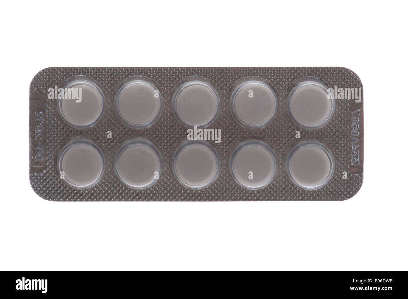 object on white tablet close up Stock Photo - Alamy