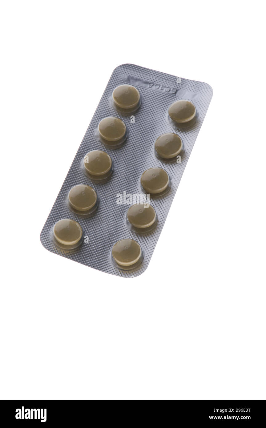 object on white tablet close up Stock Photo - Alamy