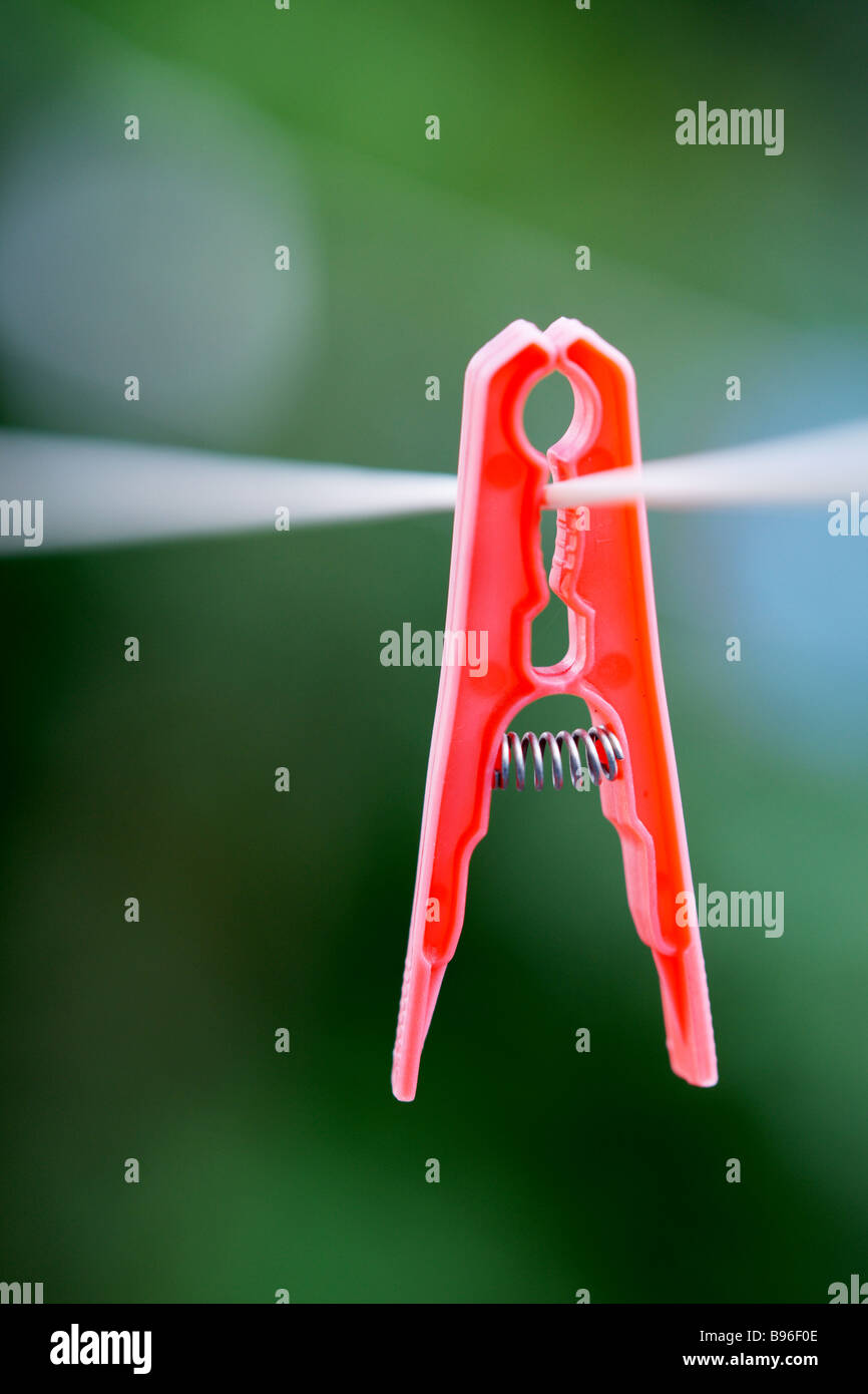 Clip clothes hi-res stock photography and images - Alamy