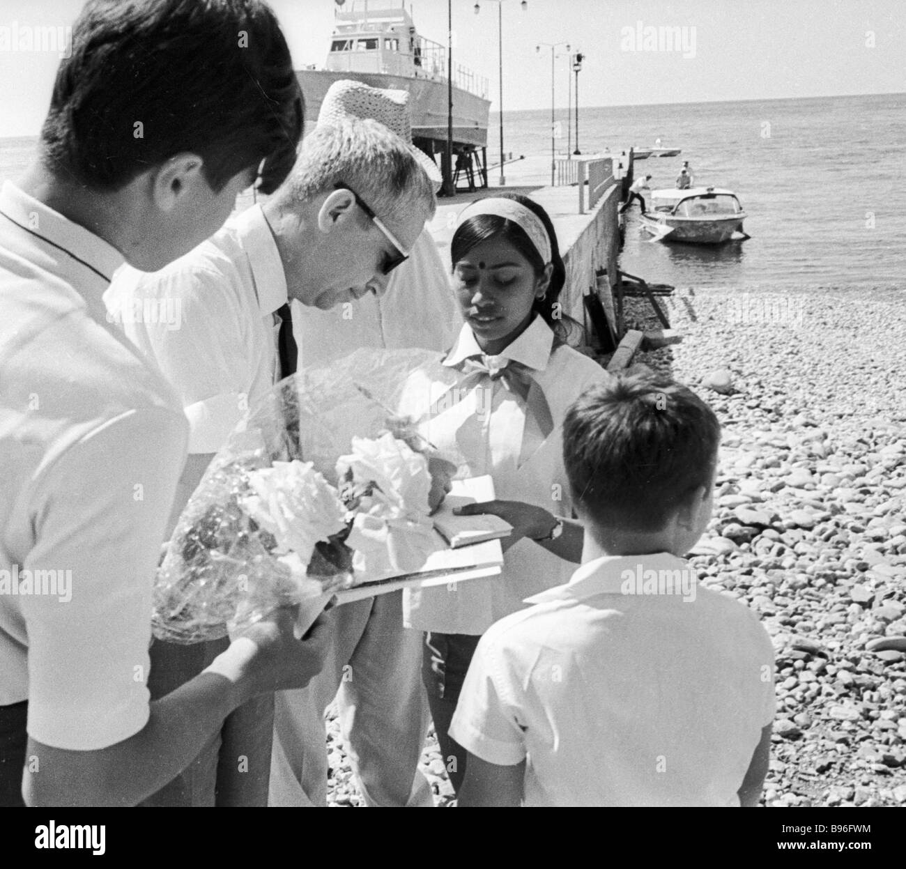Cosmonaut Konstantin Feoktistov giving autographs to Young Pioneers in ...
