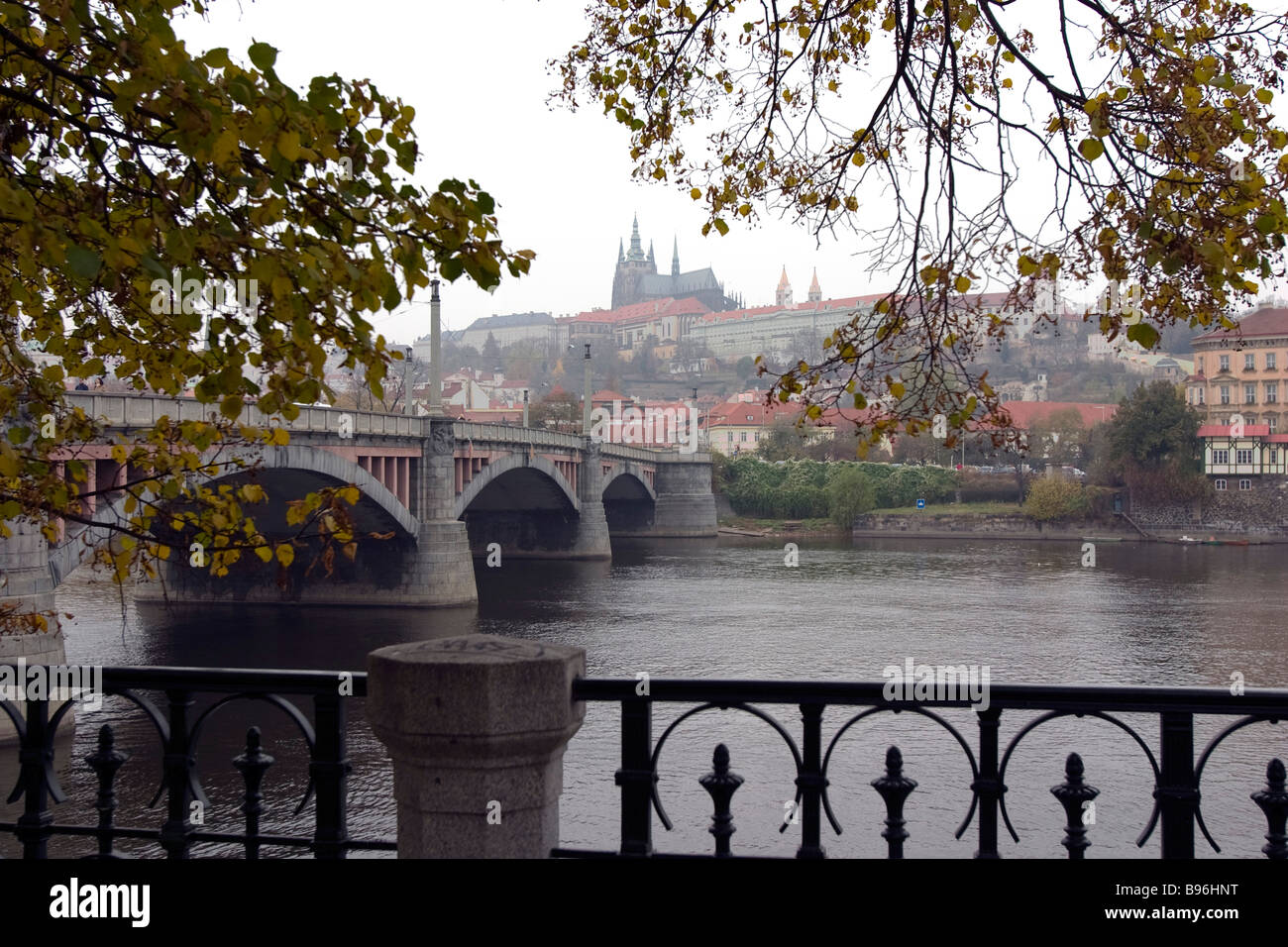 View of Manes Bridge over Vltava river and sity left side with castle ...