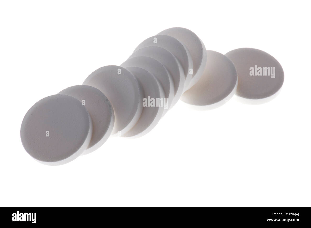 object on white tablet close up Stock Photo - Alamy