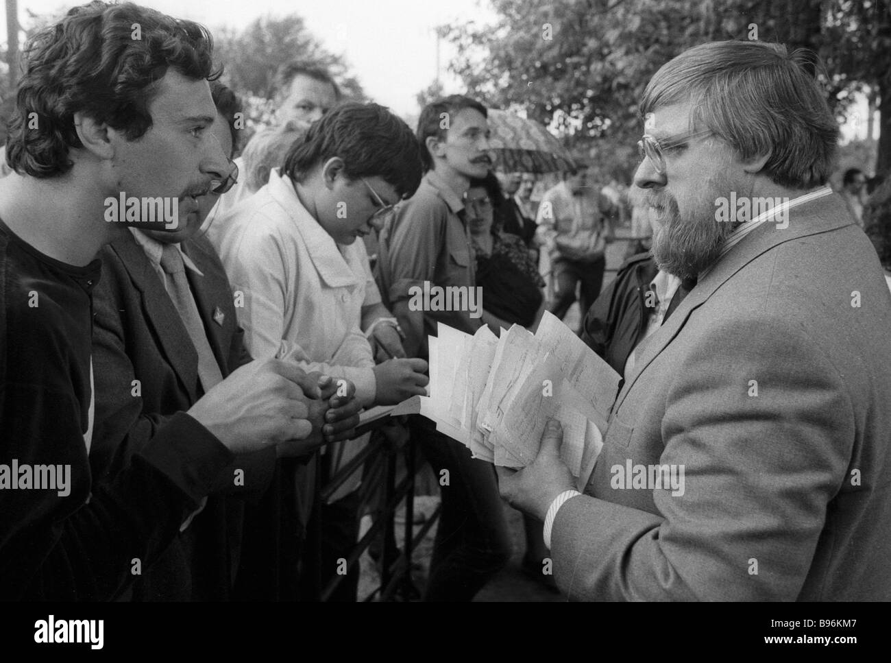 The USSR People s Deputy Valentin Dikul right converses with electors ...