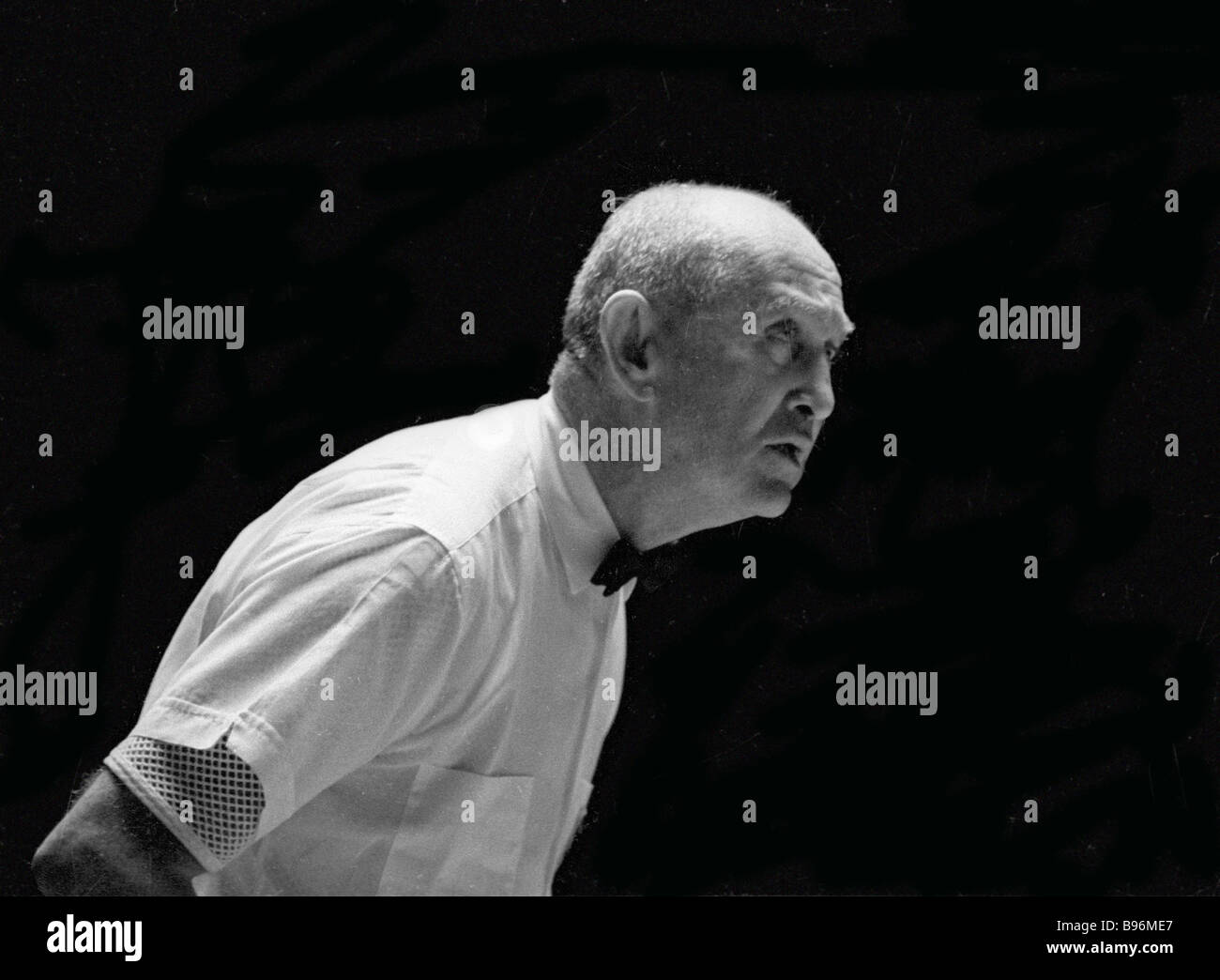 A referee watching a boxing match Stock Photo - Alamy