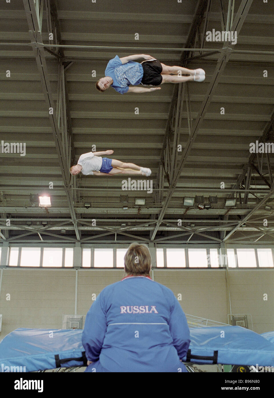 Members of the Russian trampoline tumbling team train before the next ...