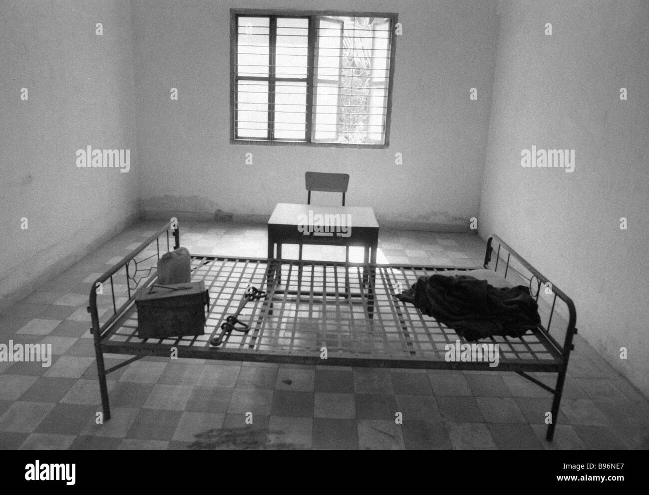 A cell in the Tuolsleng prison for Pol Pot opponents Stock Photo - Alamy