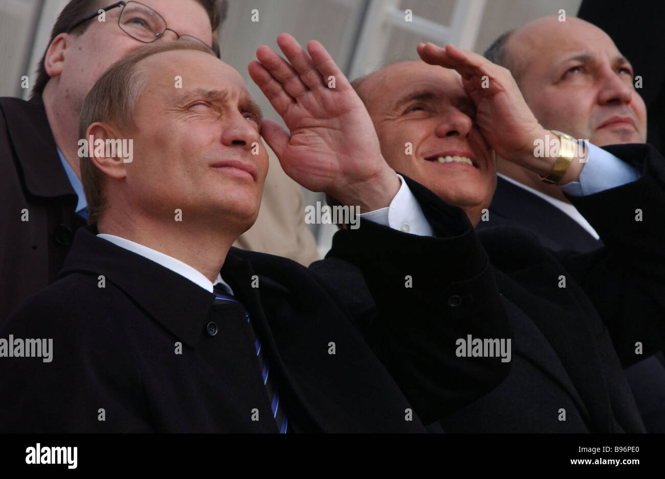 Russian President Vladimir Putin left and Italian Prime Minister Silvio ...