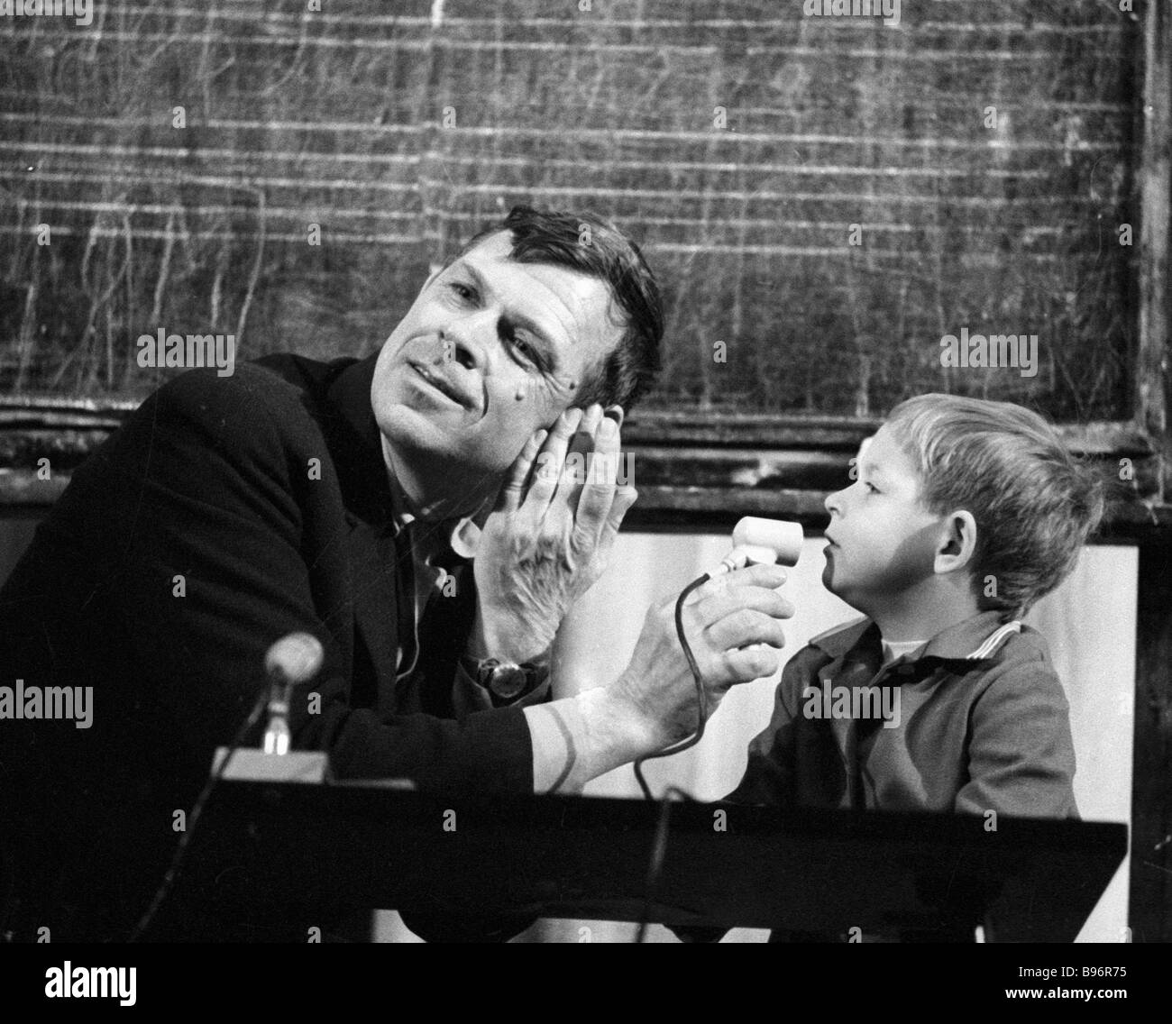 A deaf mute little girl learning to speak Stock Photo - Alamy