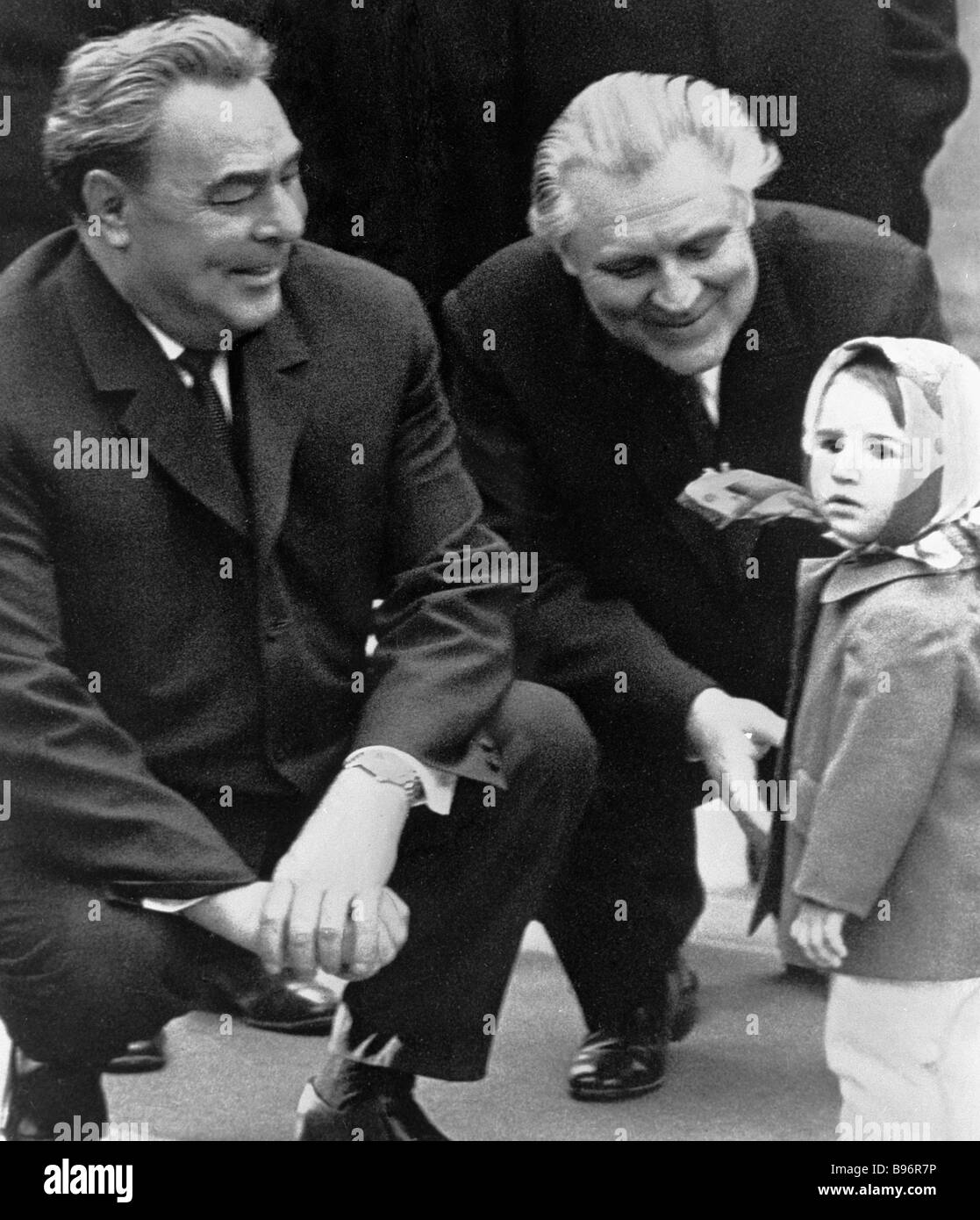 Soviet Communist Party Secretary General Leonid Brezhnev talking to a ...
