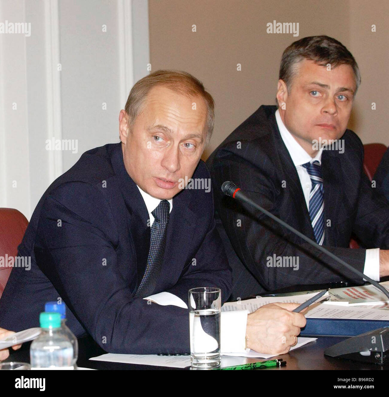 Russian President Vladimir Putin and presidential aide Alexander ...