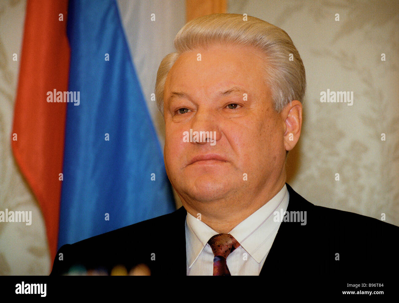 Russian President Boris Yeltsin uttering a televised address to ...