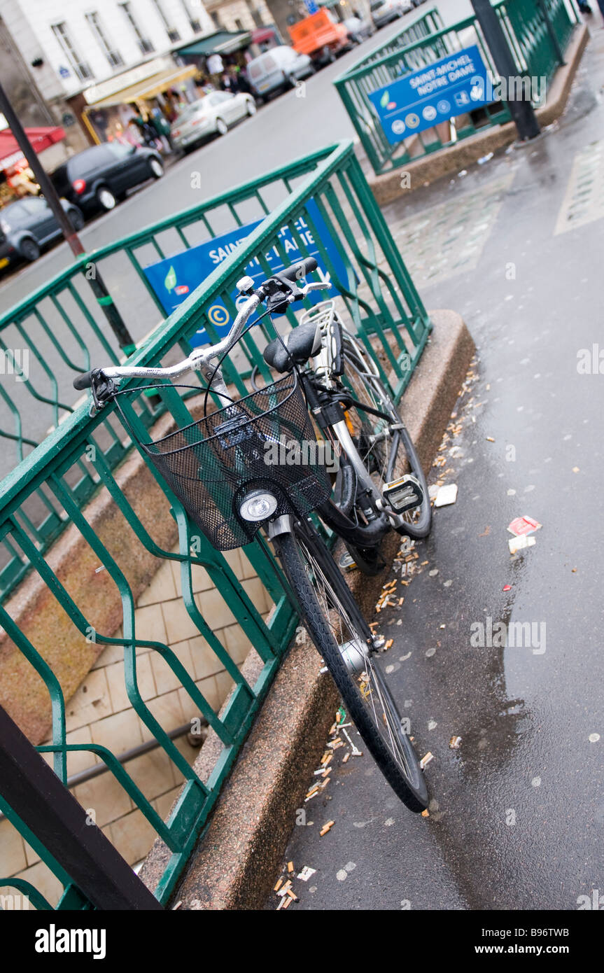 Bicycle at the exit of Metro in Paris Stock Photo - Alamy