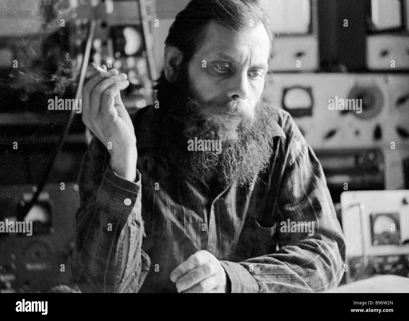 Arctic explorer reading instruments Stock Photo - Alamy