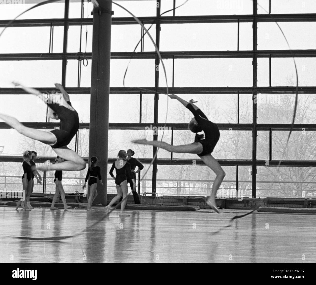 Teenagers exercising with ribbons at the children s calisthenics school ...