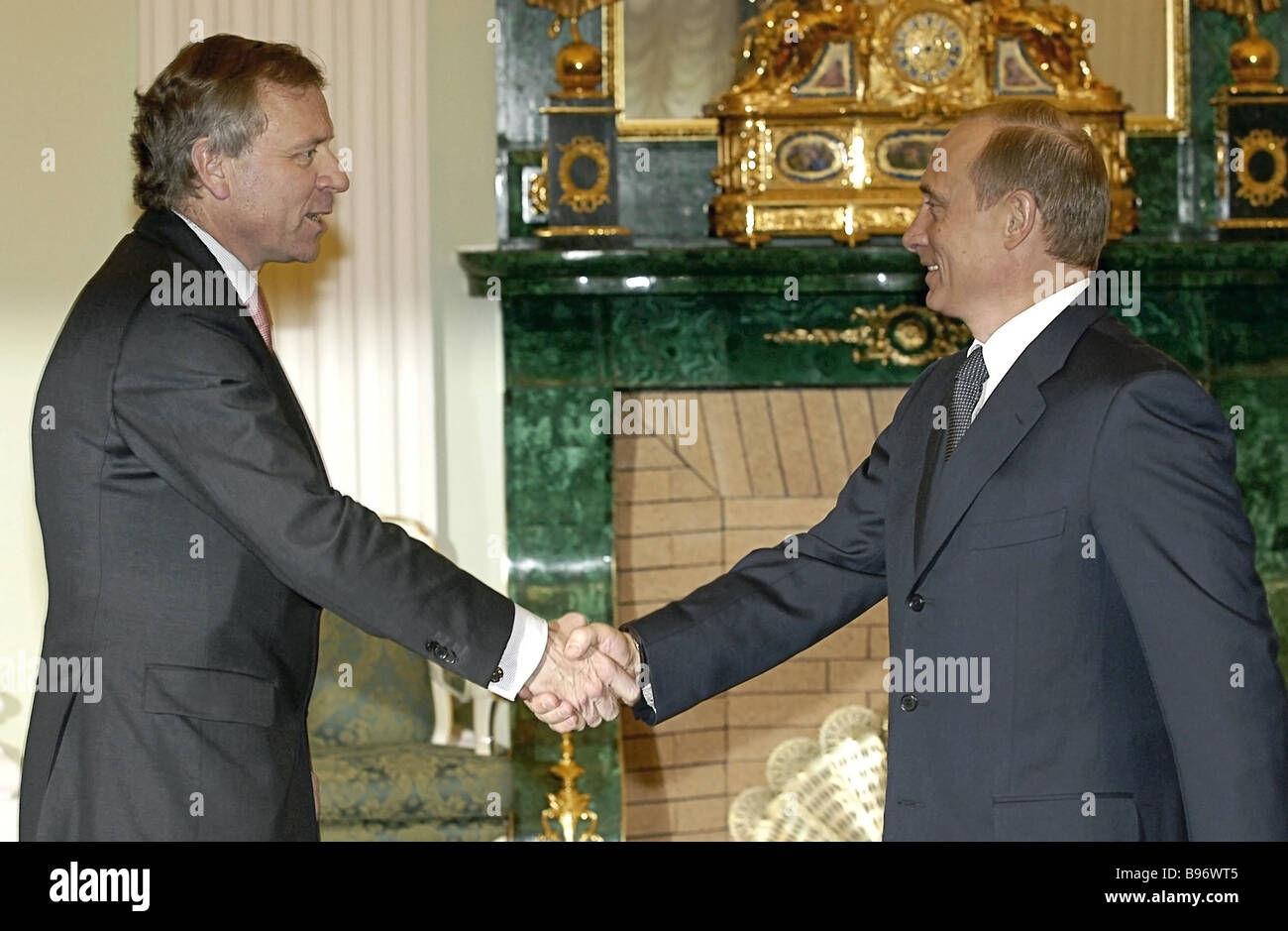 Russian President Vladimir Putin right meets NATO Secretary General ...