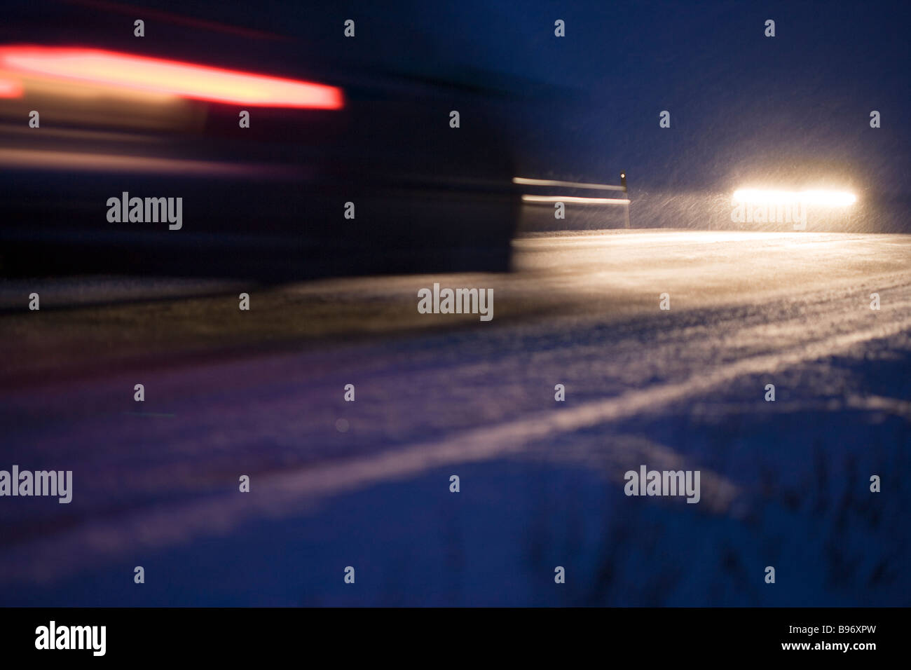 Traffic in winter snow storm Stock Photo - Alamy