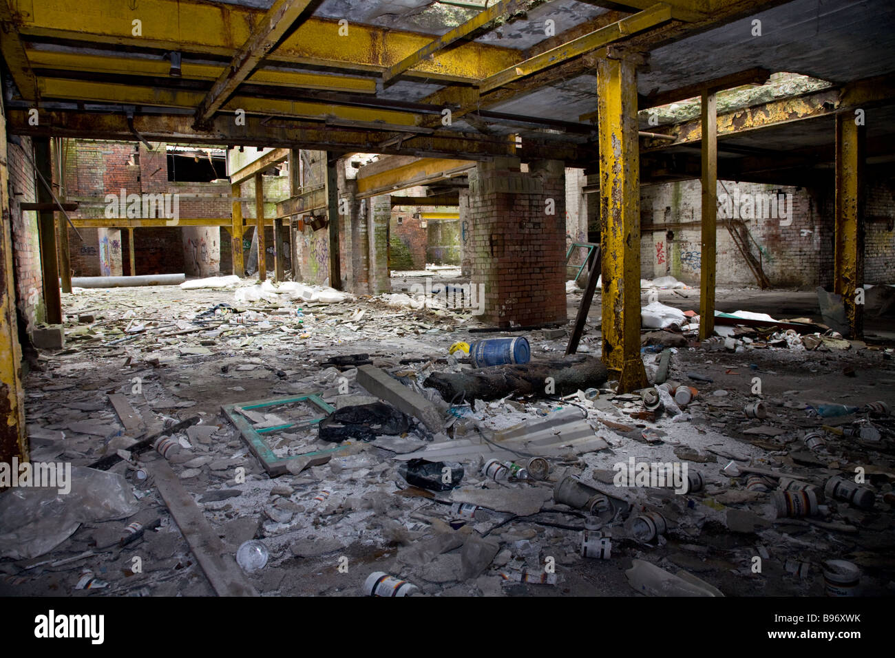 Interior of an abandoned and derelict factory Stock Photo - Alamy