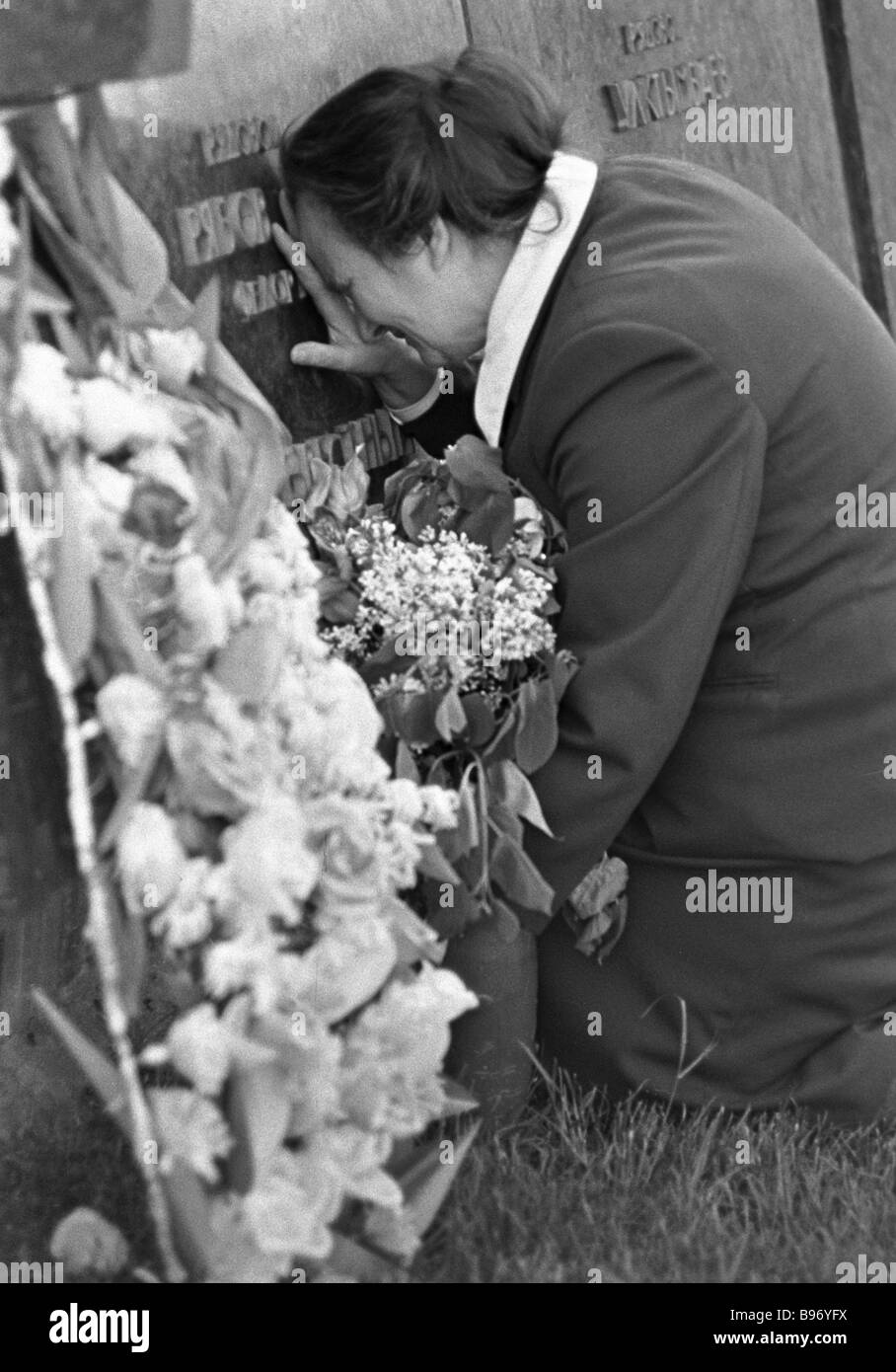 A Woman Crying Near The Grave Of Her Husband In The Brest Fortress