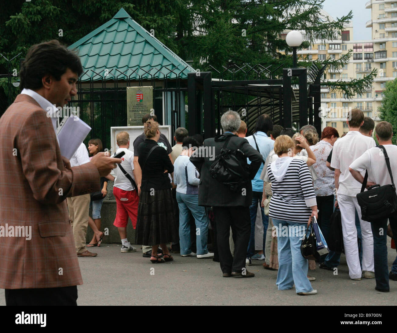 Russian citizens lining up to get visas at the consular department of ...