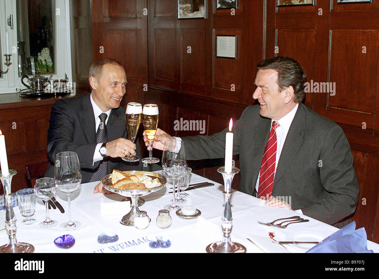 Russian President Vladimir Putin, on an official visit in Germany, and ...