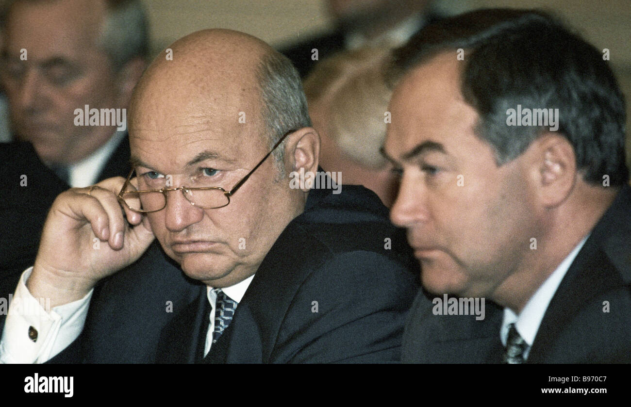 Moscow Mayor Yuri Luzhkov left and Primorye Governor Yevgeny ...