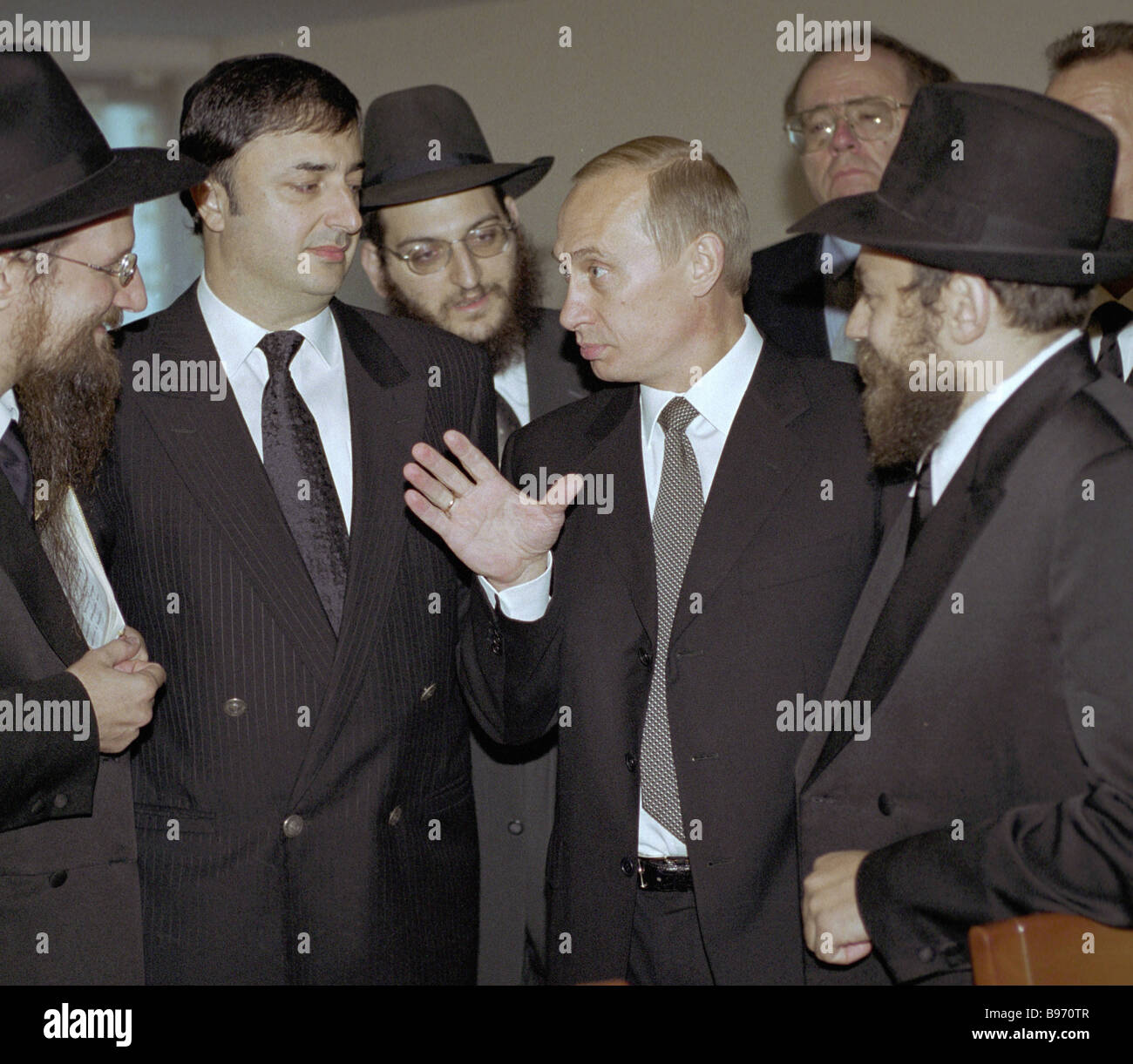 Russian President Vladimir Putin center at the opening ceremony of the ...