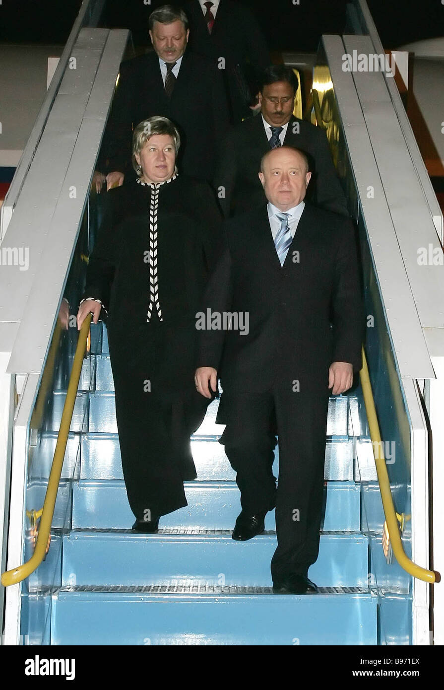 Russia s Prime Minister Mikhail Fradkov right and his wife Yelena ...