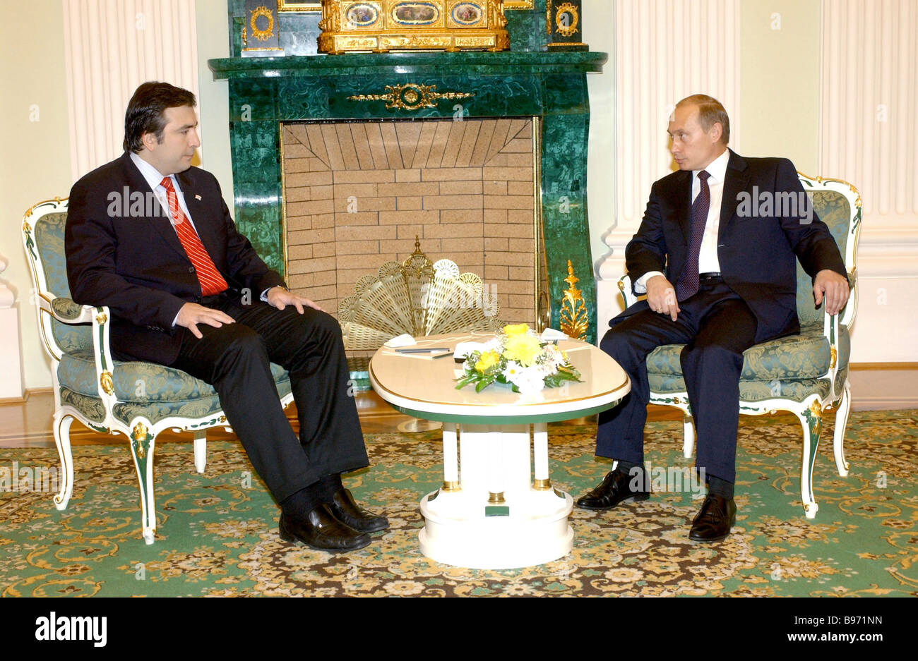 Russian President Vladimir Putin meets Georgian President Mikhail ...