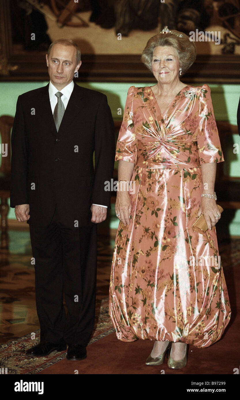 Russian President Vladimir Putin left and the Queen of the Netherlands ...