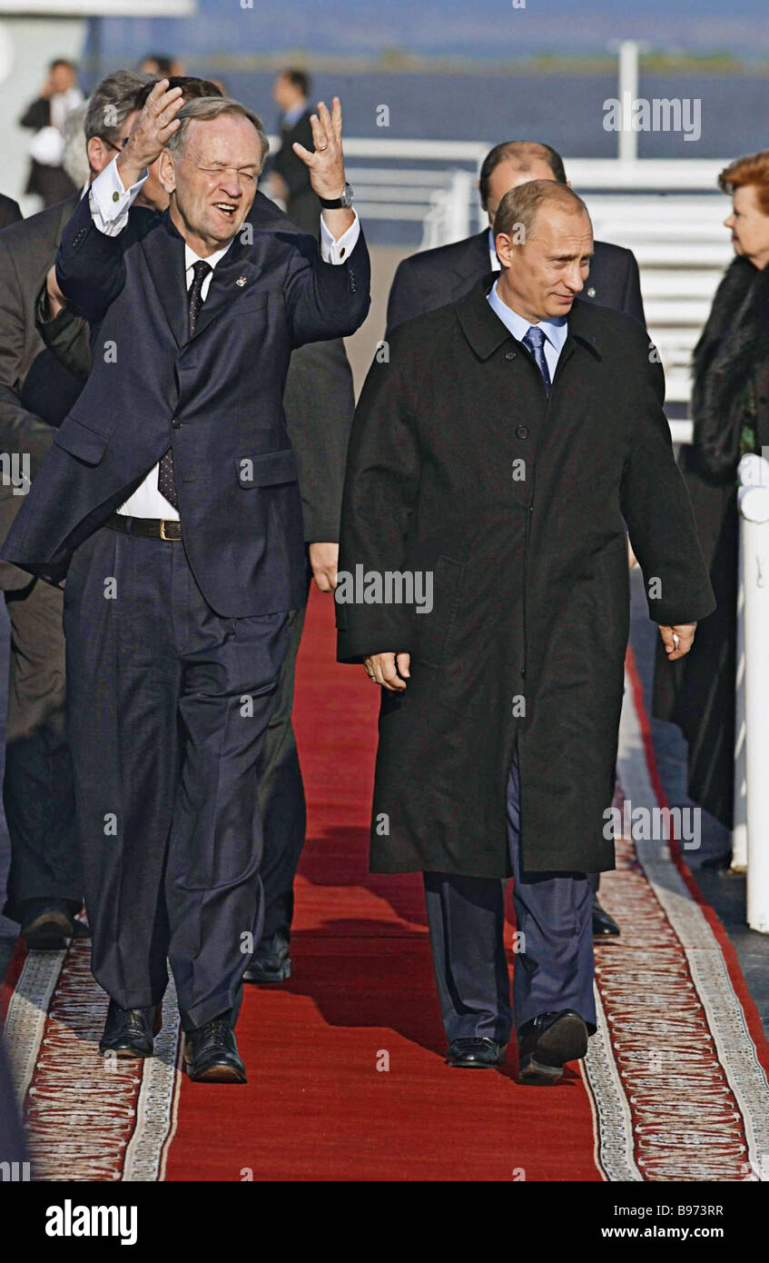 Russian President Vladimir Putin and Canadian Prime Minister Jean ...