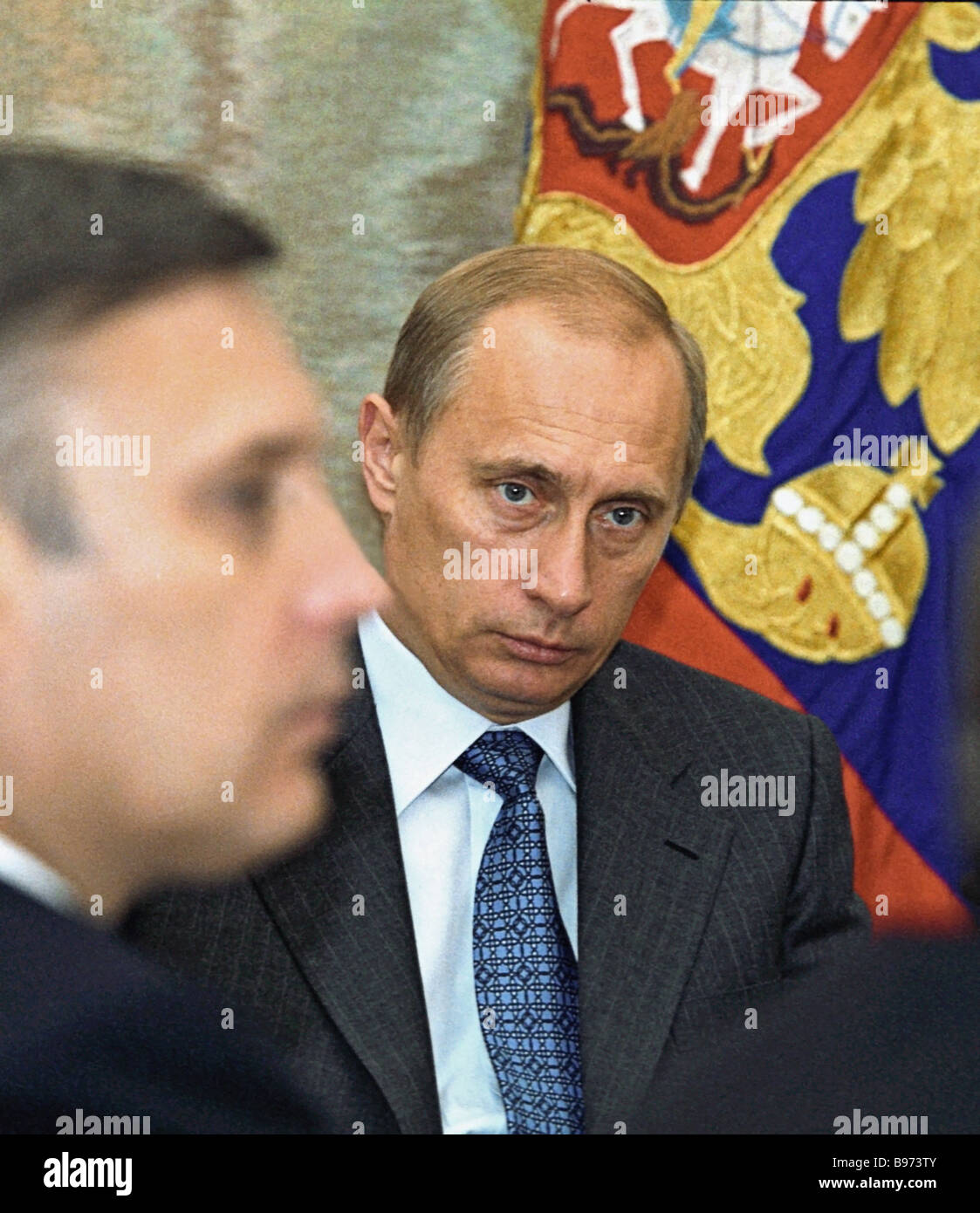 Russian President Vladimir Putin right and Prime Minister Mikhail ...