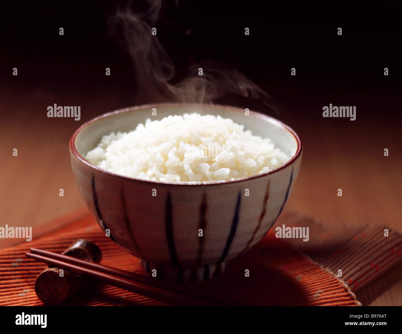 Rice with chopstick hi-res stock photography and images - Alamy