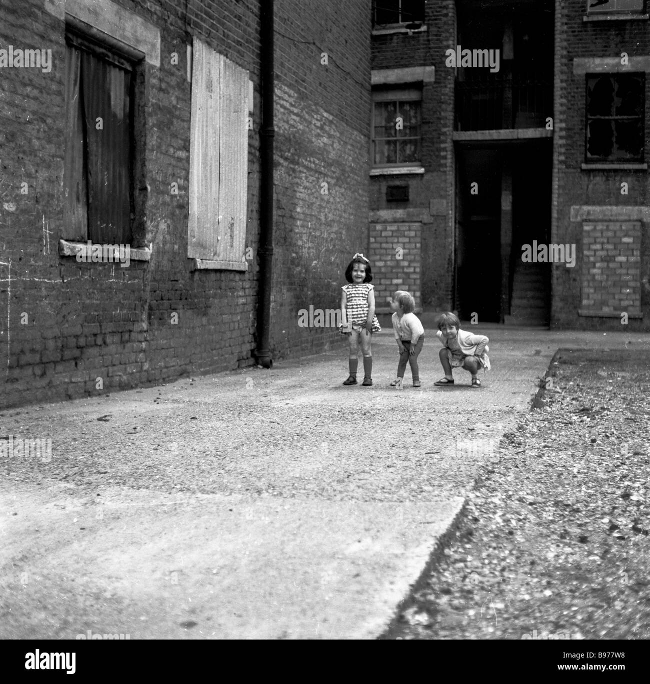 Tenement play Black and White Stock Photos & Images - Alamy